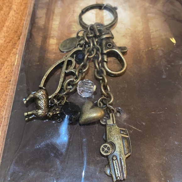 Hot Topic | Accessories | Twilight Saga New Moon Bella Swan Bag Clip ...